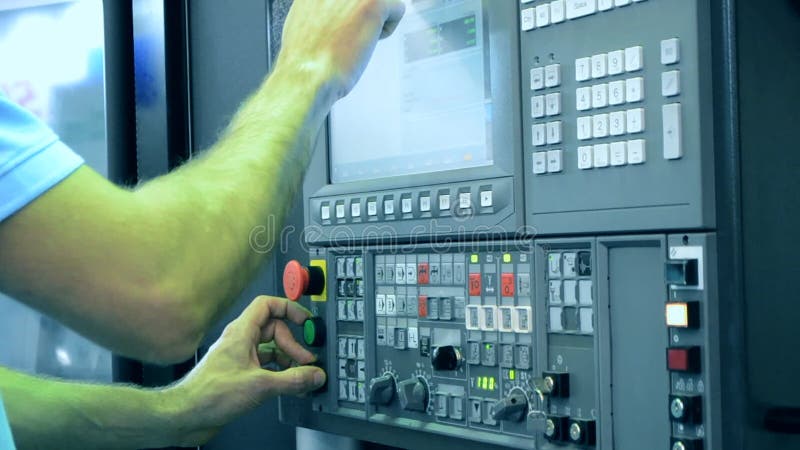 Person Works Behind the Control Panel of the Production Machine Stock ...
