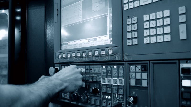 Person Works Behind the Control Panel of the Production Machine Stock ...