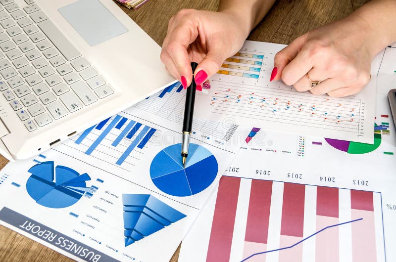 Person Works with Charts and a Computer Stock Image - Image of ...