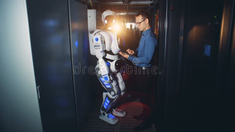 A Person Controls a Robot at a Data Center, Close Up. Stock Video ...