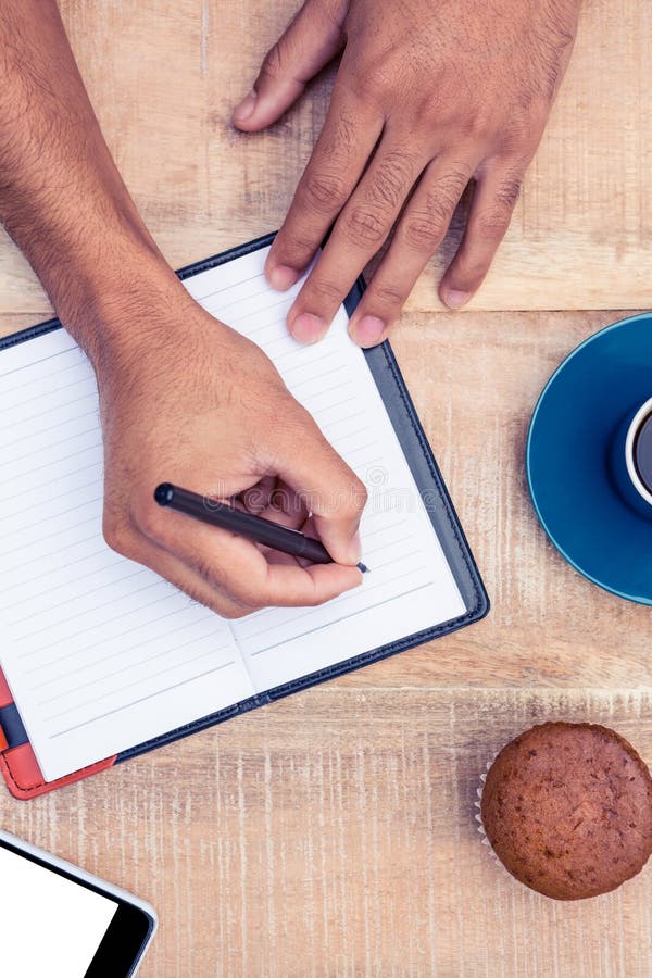Person Writing on Diary at Table Stock Image - Image of connection ...