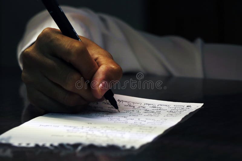A Person Writing on a White Paper with Pen in Close Up Stock Image ...
