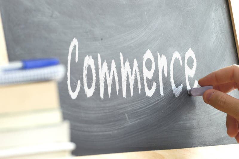 A Person Writing the Word Commerce on a Blackboard. Stock Image - Image ...