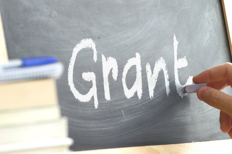 A Person Writing the Word Grant on a Blackboard. Stock Image - Image of ...