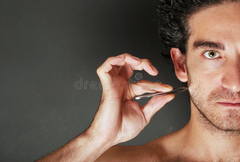 Personal Care - Man Pulling His Beard with Tweezers Stock Photo - Image ...
