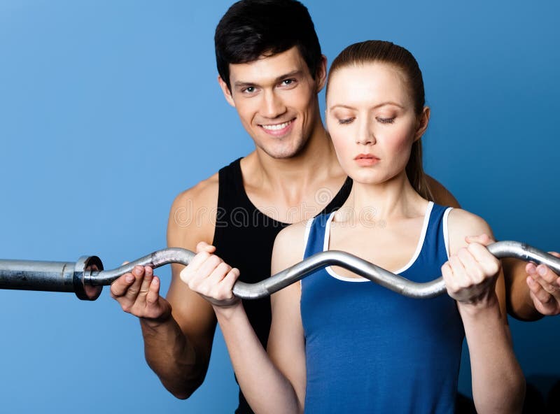 Personal Coach Shows Woman the Correct Exercise Performing Stock Photo ...