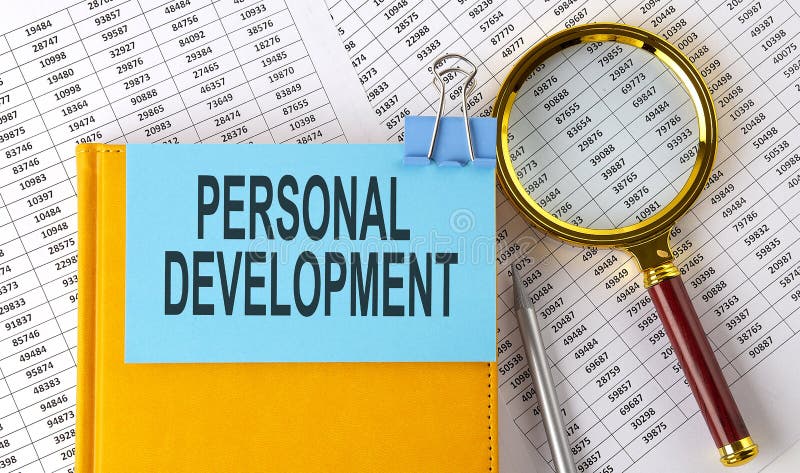 PERSONAL DEVELOPMENT Text on Sticker on Notebook with Magnifier and ...