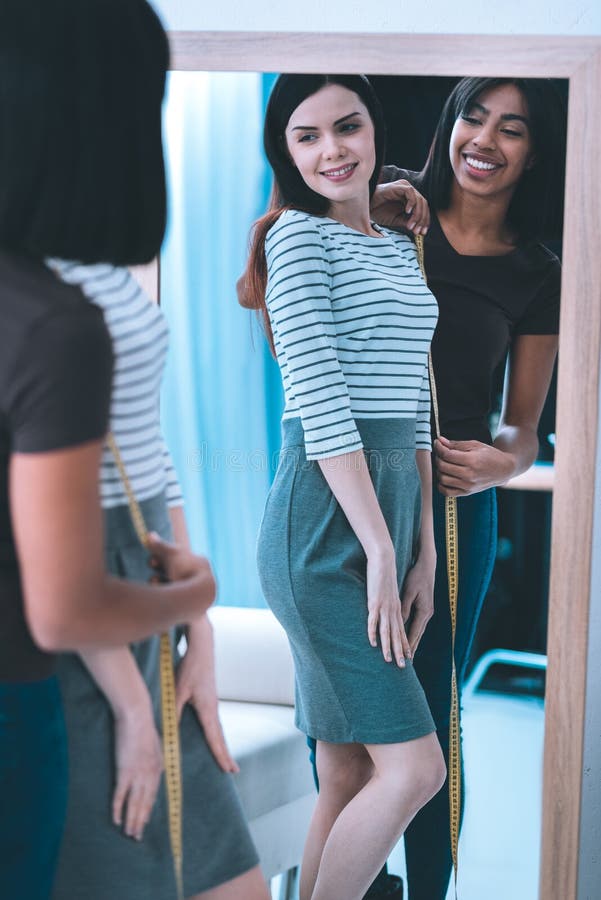 Concentrated Tailor In The Process Of Measuring Clothes Stock Photo ...