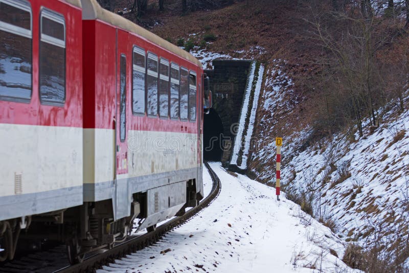 A Personal Train Enters the Tunnel and Snow Stock Photo - Image of ...