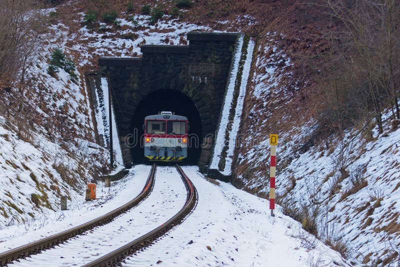 A Personal Train Enters the Tunnel and Snow Stock Image - Image of ...