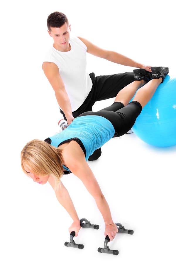 Woman Exercising with Personal Trainer Stock Image - Image of ...