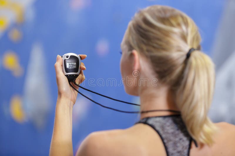 Personal Trainer Checking Stopwatch Stock Image - Image of adult ...