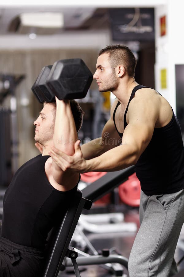 Personal Trainer Motivates Client Stock Photo - Image of gymnasium ...