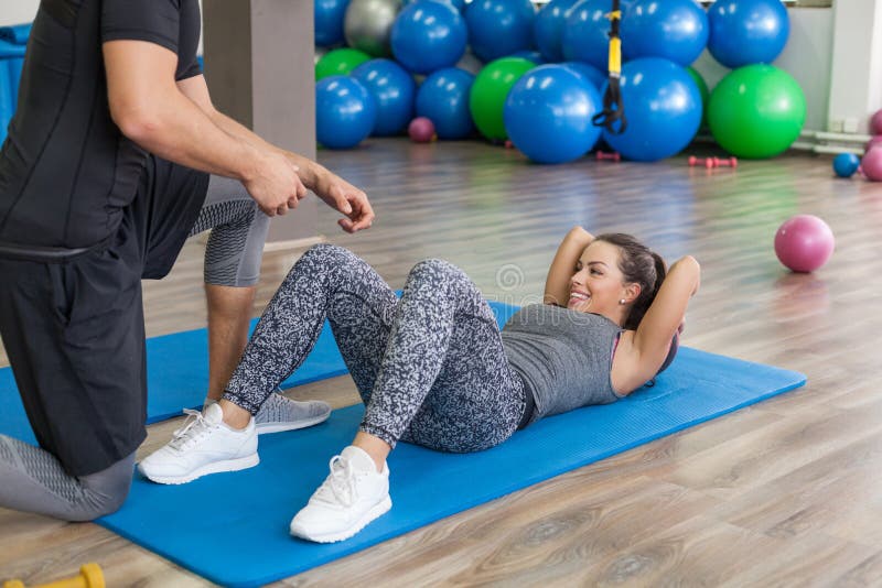 Personal Trainer with His Client Stock Photo - Image of indoors ...