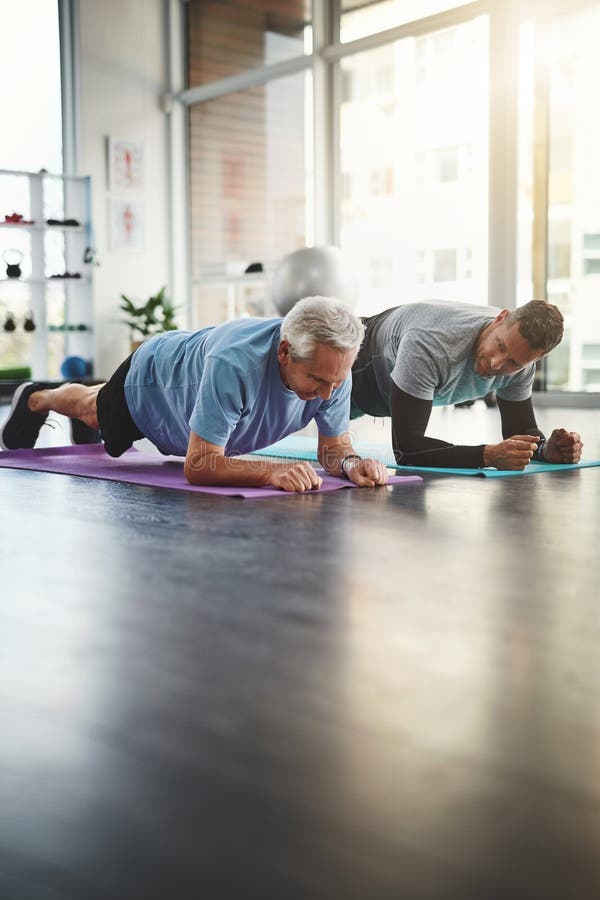 Personal Trainer Plank And Senior Man With Exercise For Rehabilitation