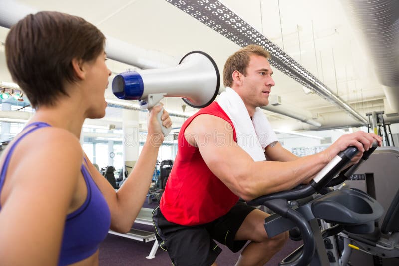 Personal Trainer Shouting at Client through Megaphone Stock Image ...