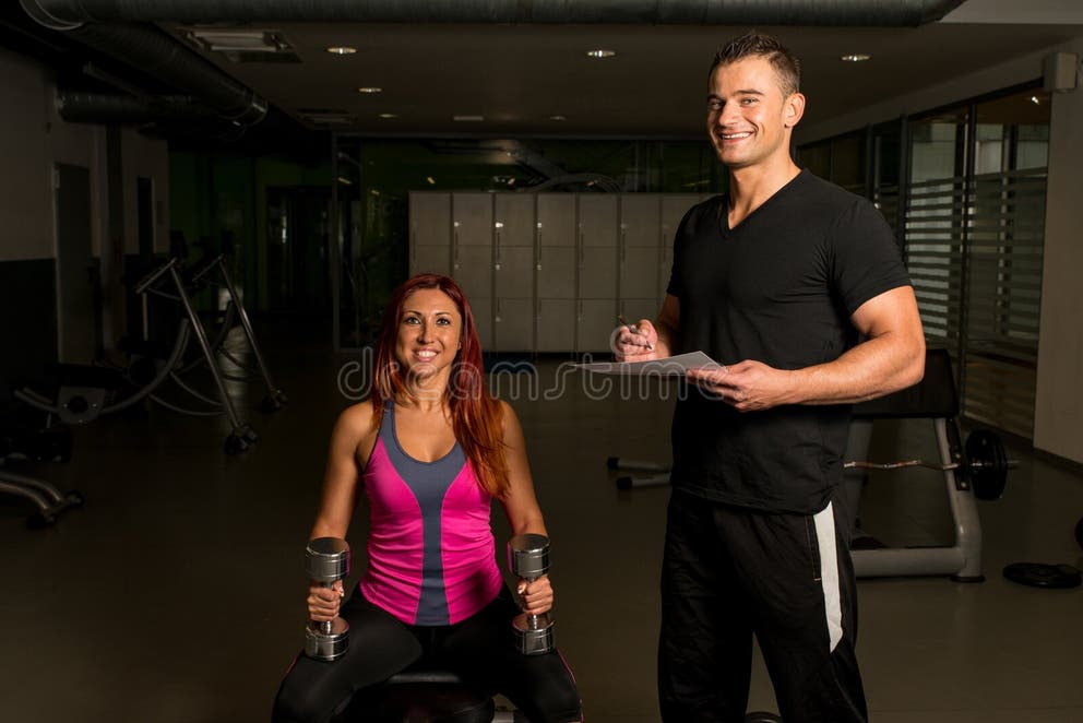 Personal Trainer Take Notes Stock Photo - Image of individuality ...