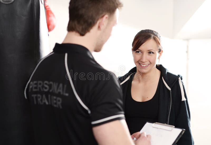 Personal Trainer Writing Training Notes Stock Photo - Image of body ...