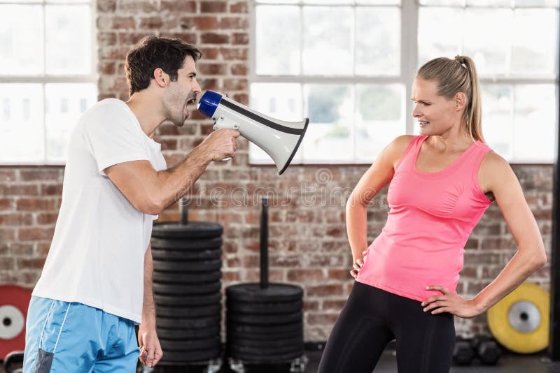 Personal Trainor Motivating His Client with Megaphone Stock Image ...