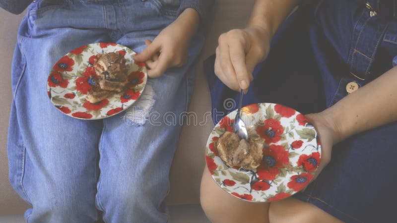 Persons with an Unrecognizable Faces Eating Cake from a Plate Stock ...