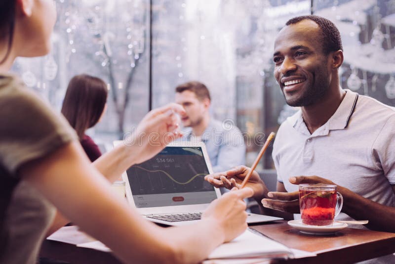 Budding Two Colleagues Discussing Project Stock Image - Image of ...