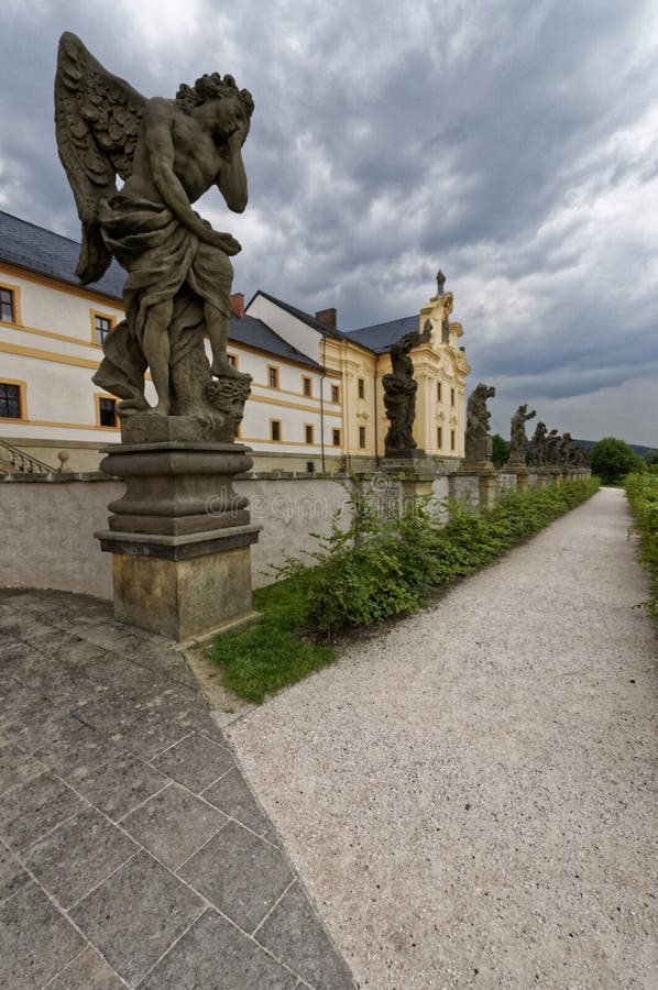 Perspective Shot of a Statue in the Forefront of a Palace Stock Photo ...