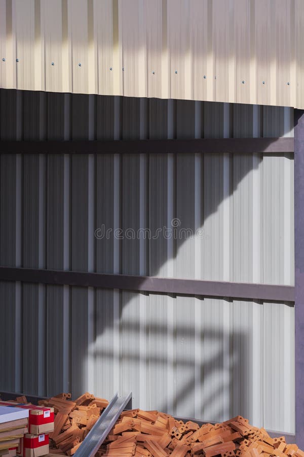 Various Construction Material in Storage Room Made of Metal Sheet ...
