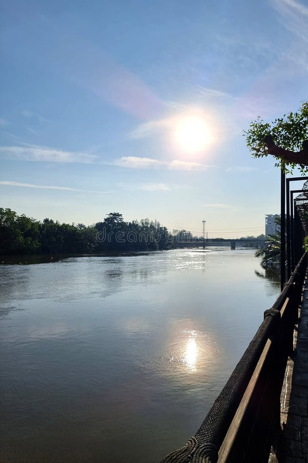 The Riverside with the Sun Reflection on the Water Stock Image - Image ...