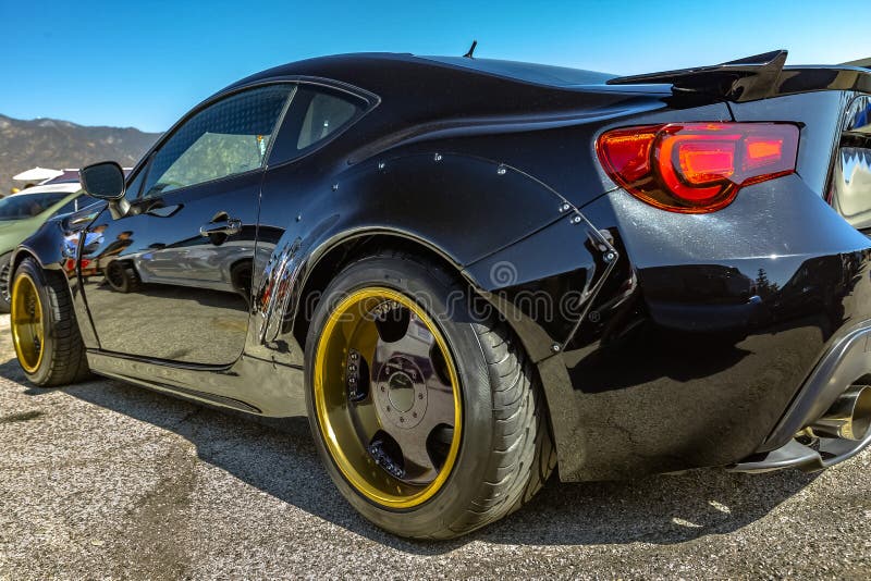 Perspective View of a Black Car from the Back Driver Side Stock Photo ...