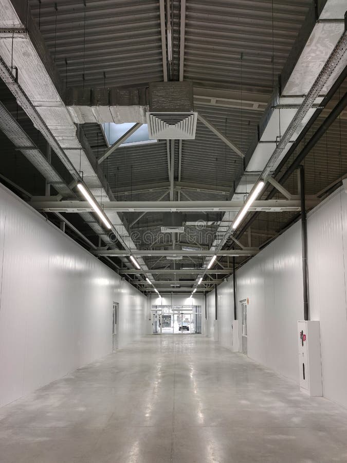 Perspective View of an Empty Hangar Hall Under Construction with ...