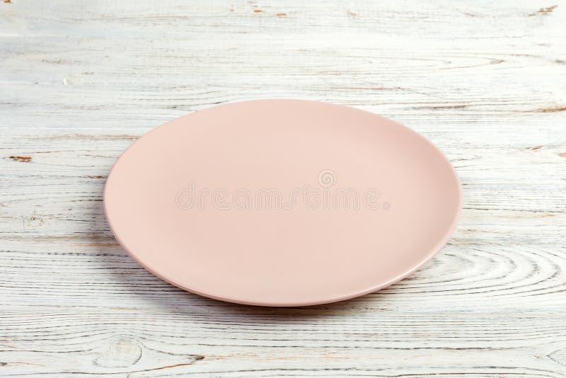 Perspective View. Empty Pink Matte Plate on White Wooden Background ...