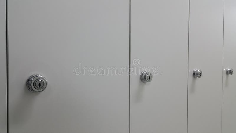 Perspective View of Lockers or Cupboards in a Row with White Doors ...