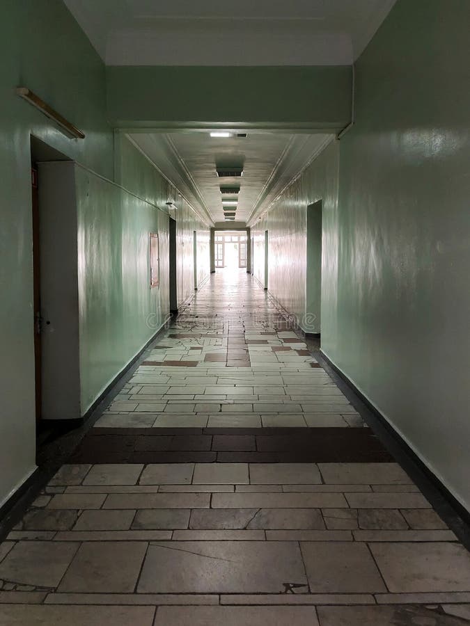 Perspective View of a Long Corridor at the End of Which There is Bright ...