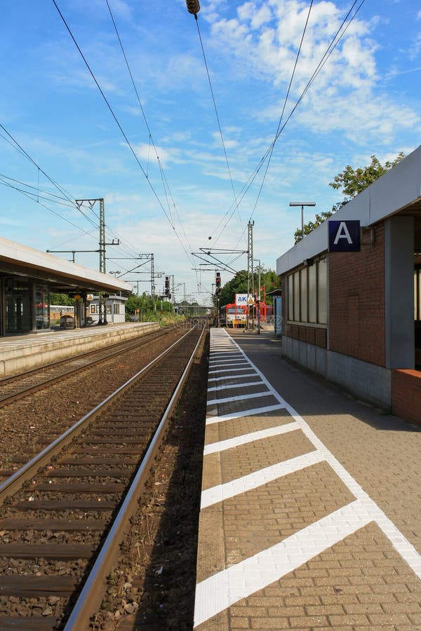 Perspective View of Train Tracks and Platform at Train Station of ...