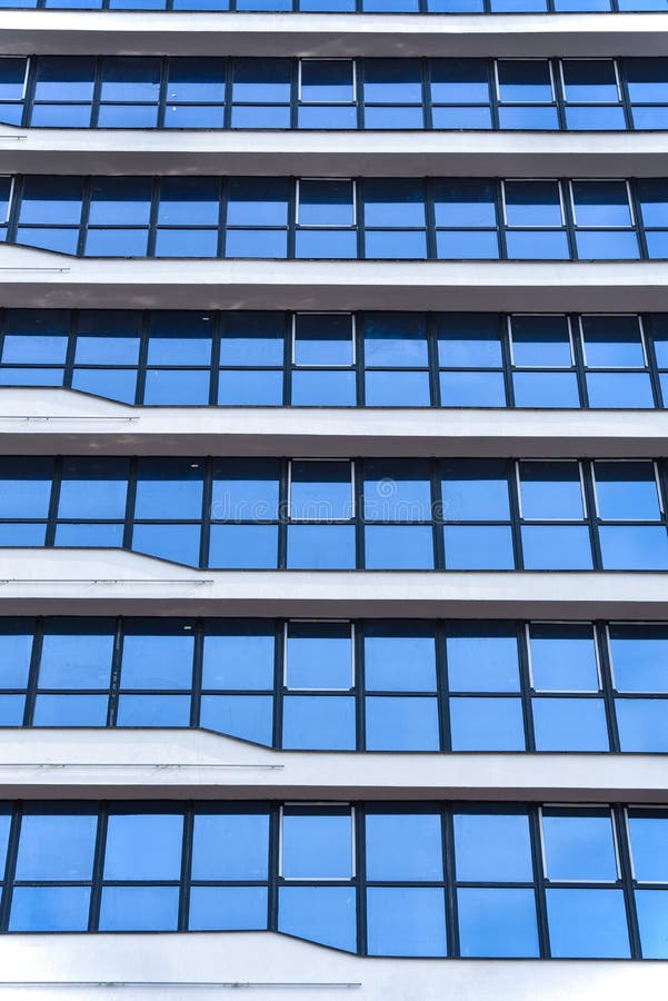 Perspective Wall of a Tower of Glass Windows Stock Photo - Image of ...