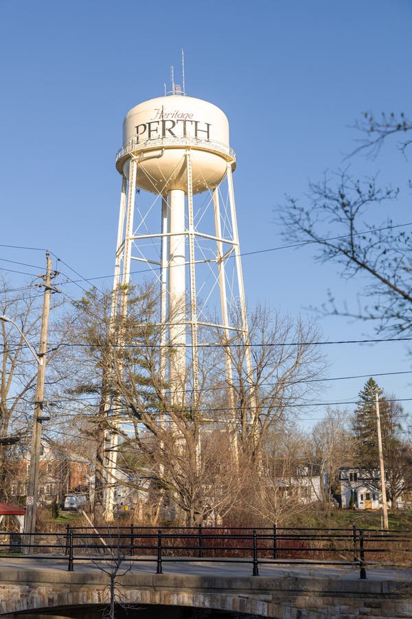 Park with Creek and Water Tower in Perth, Ontario, Canada. Editorial ...