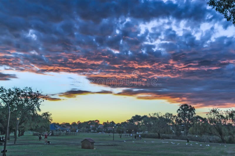 Perth - 2011: Sunset at a Park with Dark Clouds Editorial Photography ...