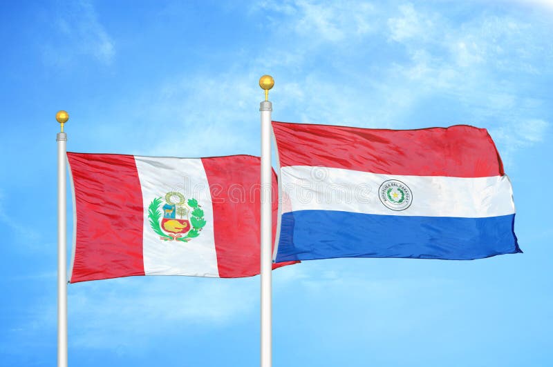 Peru and Paraguay Two Flags on Flagpoles and Blue Sky Stock ...