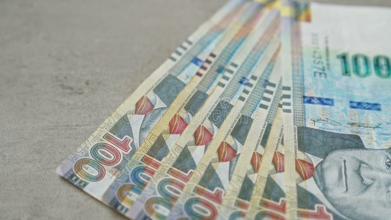 Peruvian Banknotes Placed on a Concrete Surface Showcasing a Close-up ...