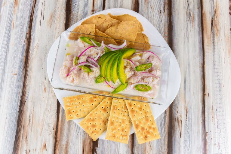 Peruvian Ceviche with Avocado and Crackers Stock Photo - Image of ...