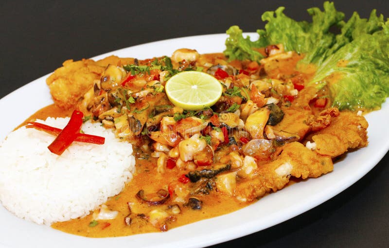 Peruvian Culinary Fried Fish a Lo Macho Style with Seafood Sauce Stock ...
