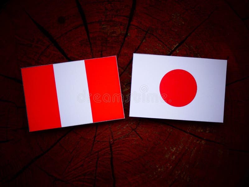 Peruvian Flag with Japanese Flag on a Tree Stump Isolated Stock Photo ...