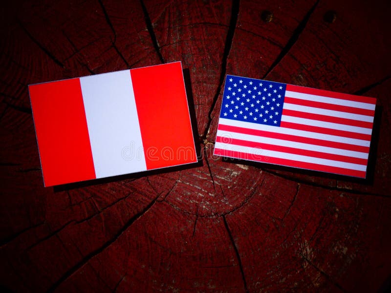 Peruvian Flag with USA Flag on a Tree Stump Stock Image - Image of flag ...