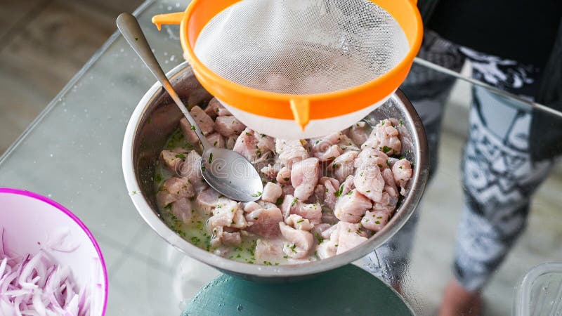Peruvian Food Ceviche. 5 Preparation of the Ceviche, Straining the ...