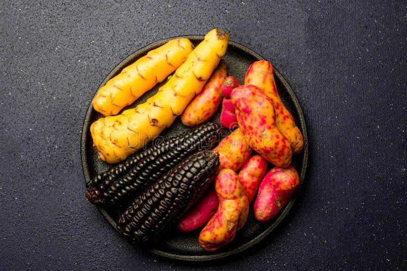 Peruvian Raw Ingredients for Cooking Black Corn and Sweet Potatoes. Top ...
