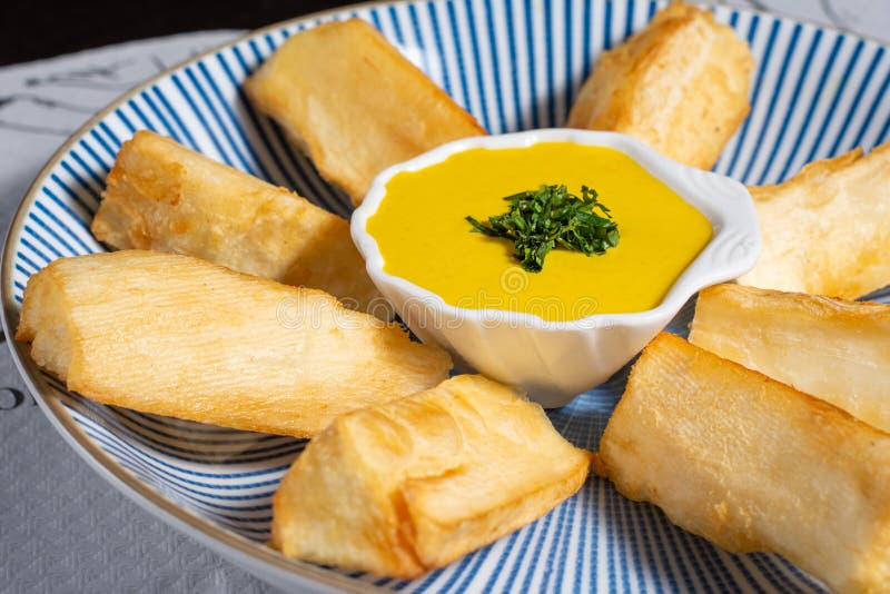 Peruvian Traditional Food. Fried Yucca with Sauce Stock Photo - Image ...