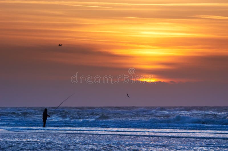 Pesca en la playa foto de archivo. Imagen de colorido - 1794702