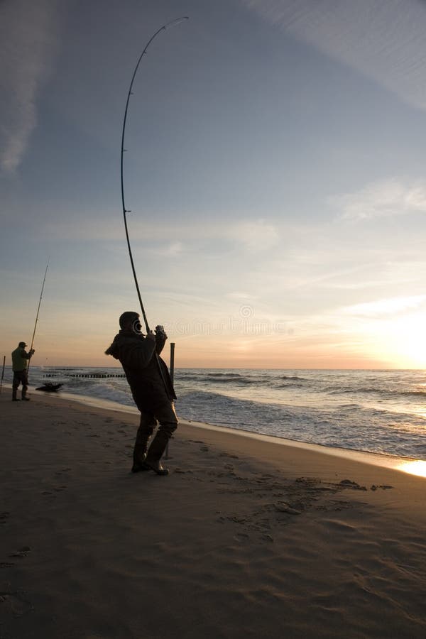 Pesca na praia foto de stock. Imagem de carretel, peixes - 2342062