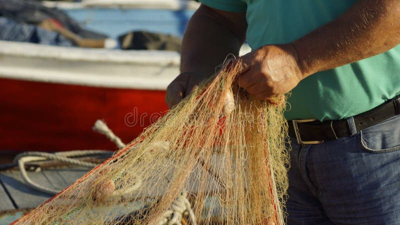 Pescador y red foto de archivo. Imagen de pescados, redes - 139510844