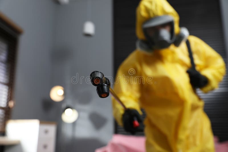 Pest Control Worker in Protective Suit, Focus on Insecticide Sprayer ...